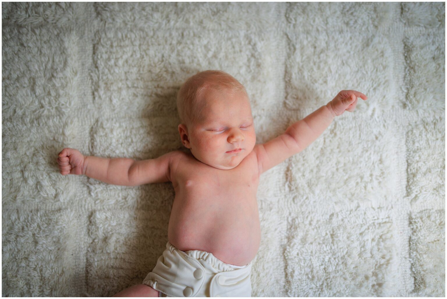 11 Best Newborn Photography Poses (Shot List Included!)